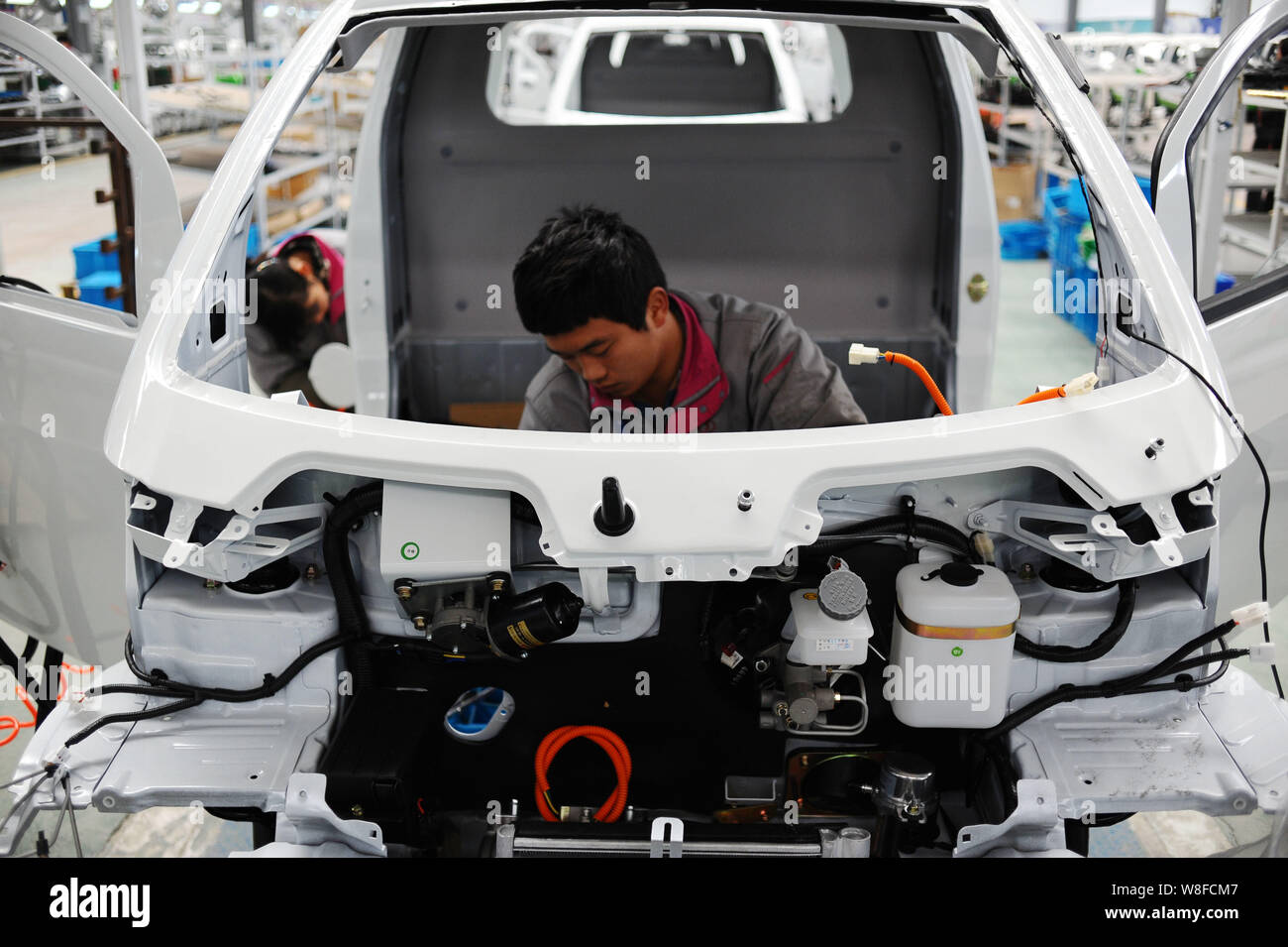 Electric vehicles production and china hi-res stock photography and ...