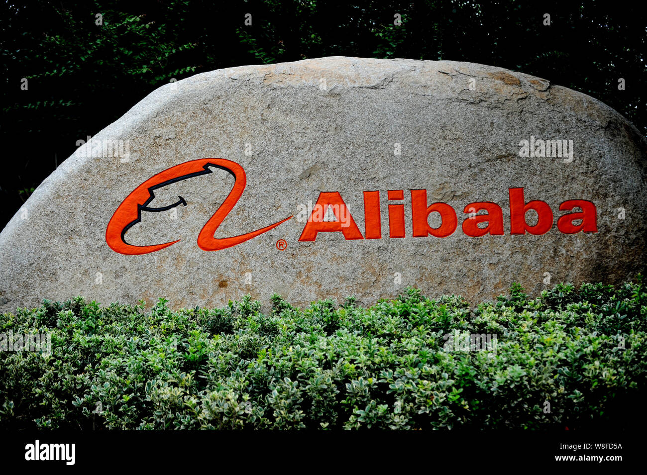 --FILE--A signboard of Alibaba is seen in front of Alibaba Group's ...