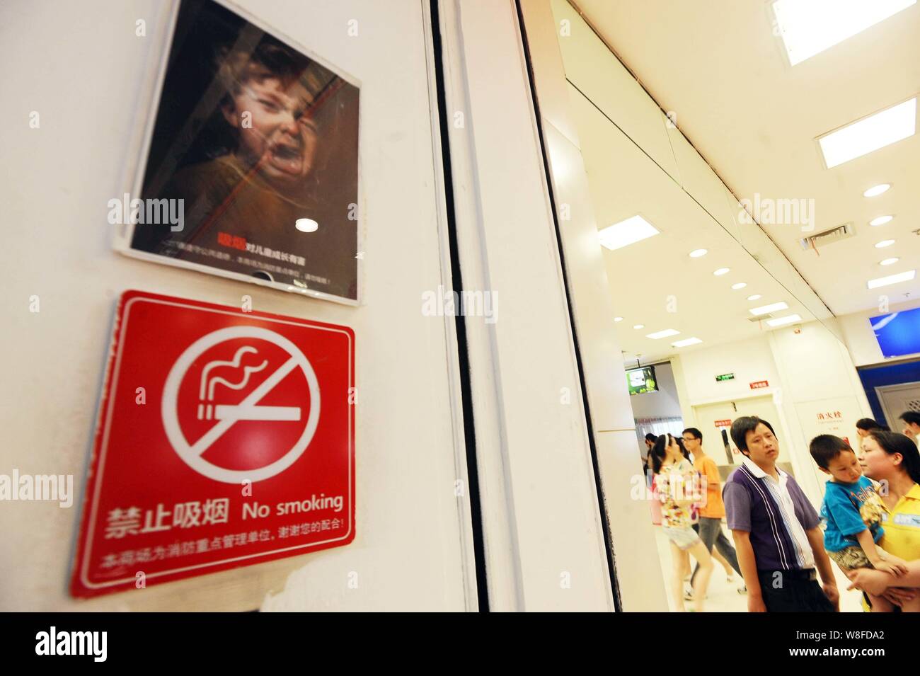 --FILE--A No Smoking sign is pictured in a shopping mall in Wuhan city ...