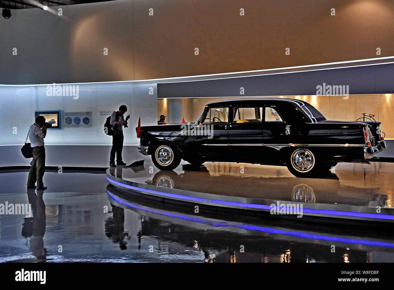 --FILE--Visitors take photos of a Hongqi (Red Flag) L5 of FAW on ...