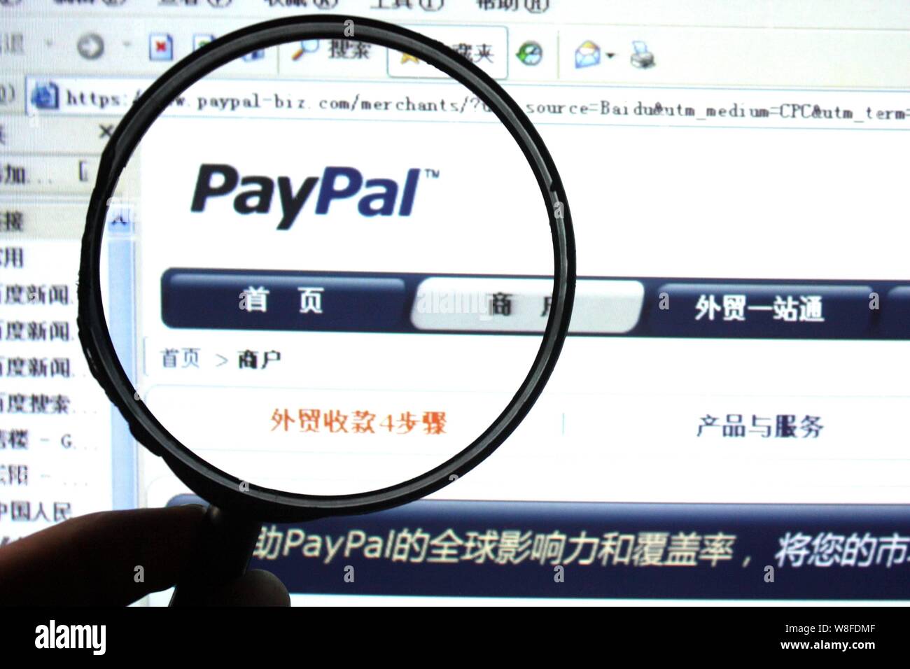 --FILE--A Chinese netizen browses the website of PayPal in Chongqing ...