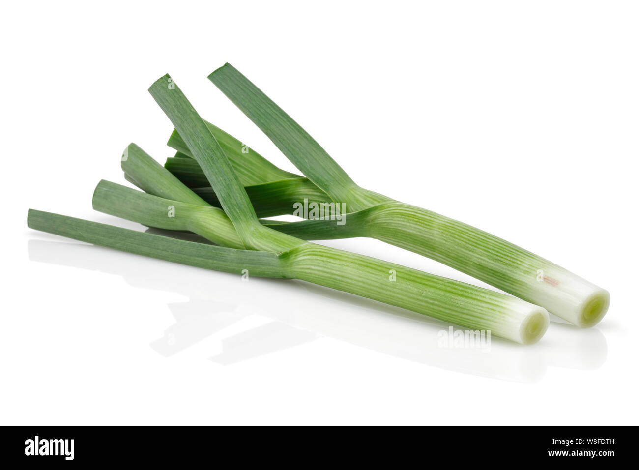 Fresh green garlic isolated on white background Stock Photo - Alamy