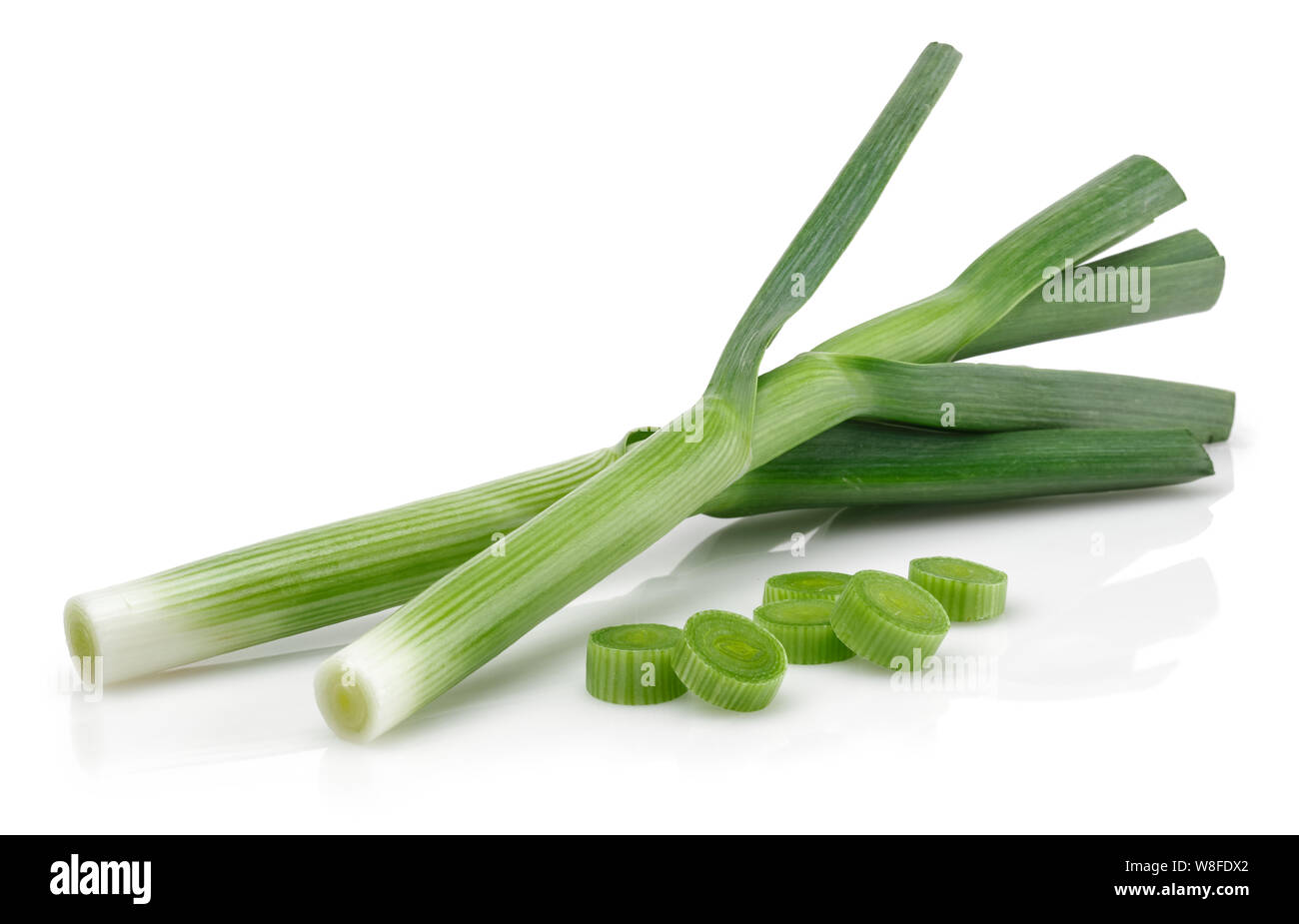 Fresh green garlic with slices isolated on white background Stock Photo ...