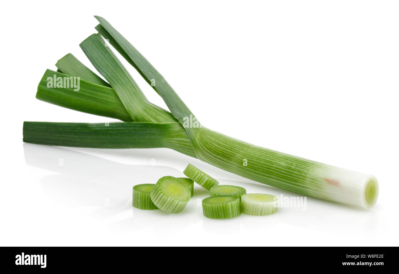 Fresh green garlic with slices isolated on white background Stock Photo ...