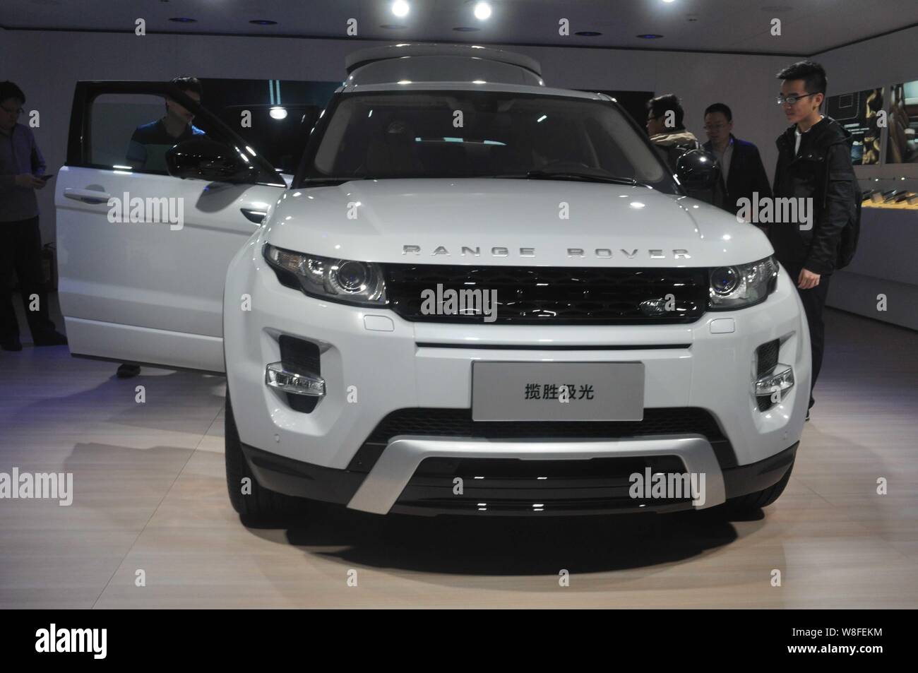 --FILE--Visitors look at a Range Rover Evoque of Jaguar Land Rover on ...