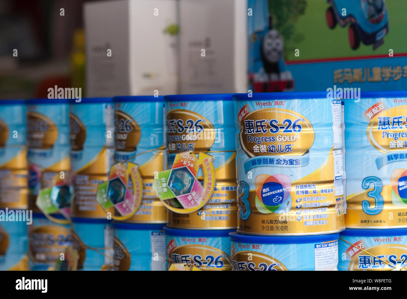 --FILE--Tins of Wyeth infant milk formula are for sale at a supermarket ...