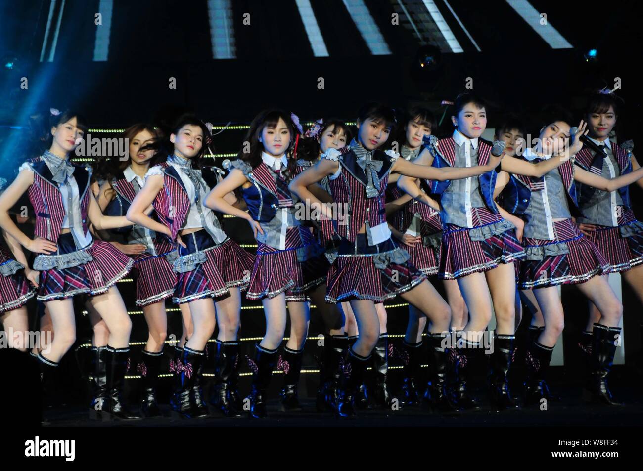 Members of idol group SNH48, a sister group of Japanese pop girl group ...