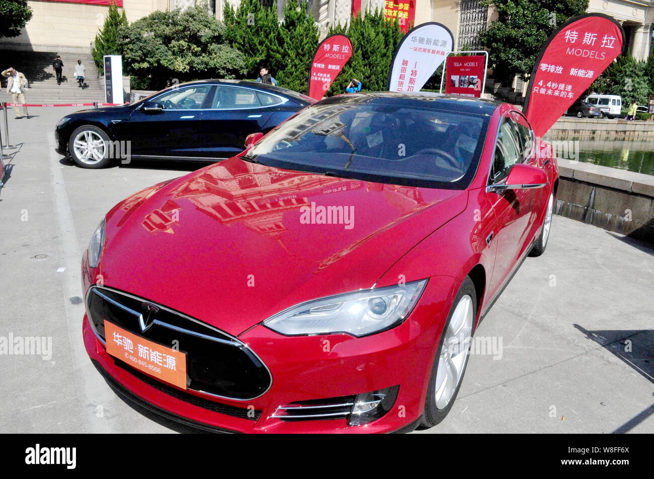 --FILE--Tesla Model S electric cars are on display at an exhibition in ...