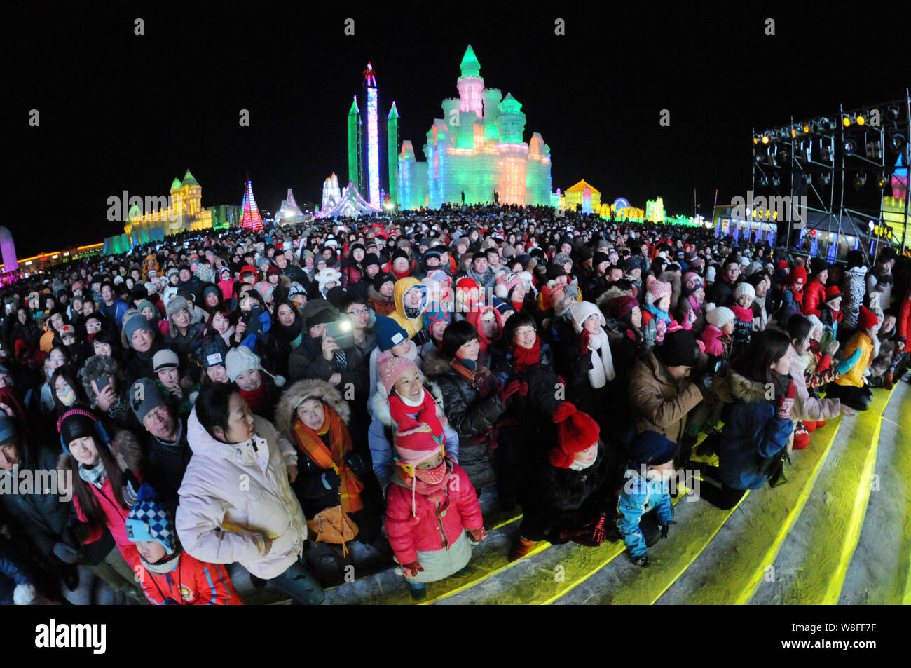 Tourists crowd at the 31st Harbin International Ice and Snow Festival ...