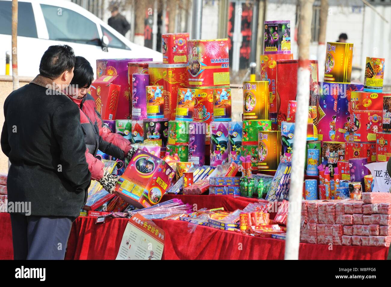 --FILE--Local Chinese residents buy fireworks and firecrackers at a ...
