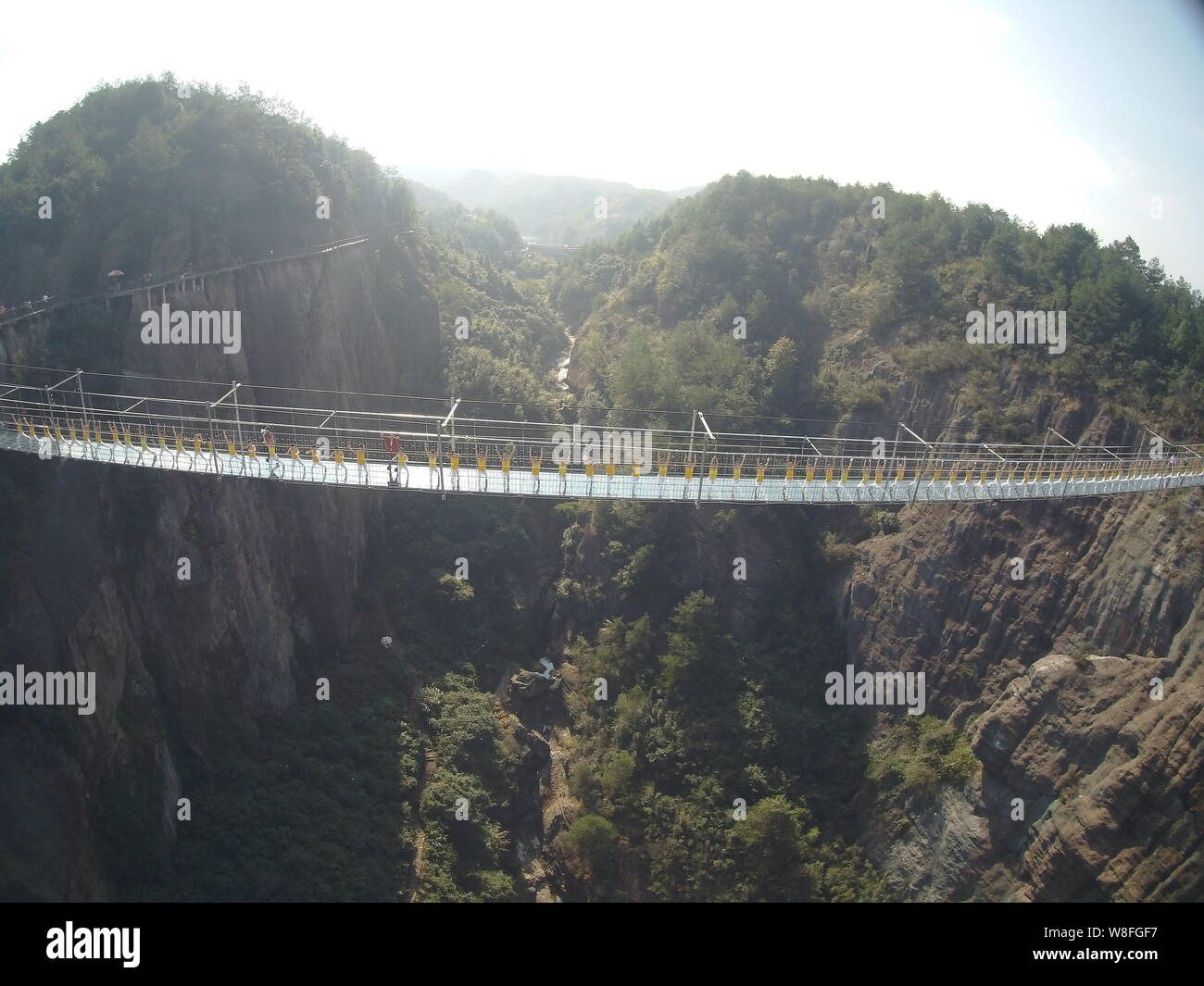 Chinese women perform yoga on the 180-meter-high and 300 meter-long ...