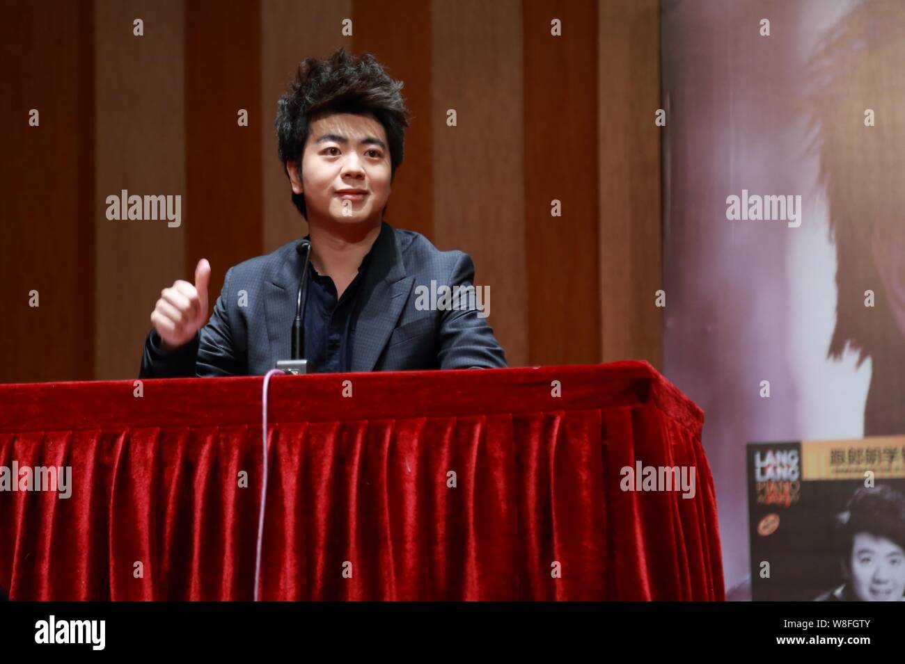 Chinese pianist Lang Lang poses at a press conference for his new book ...