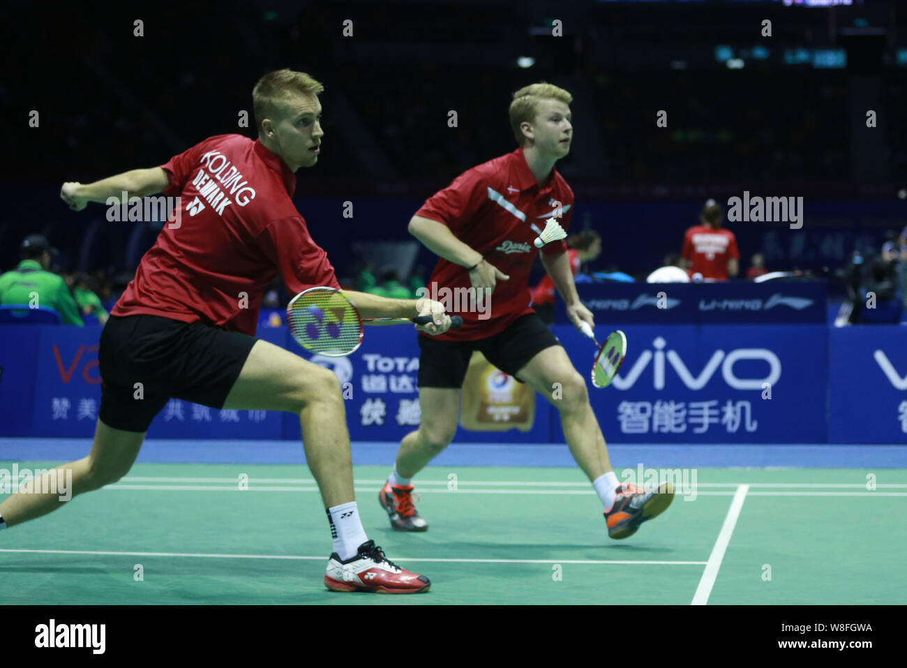 Kim Astrup, right, and Mads Pieler Kolding of Denmark compete against ...