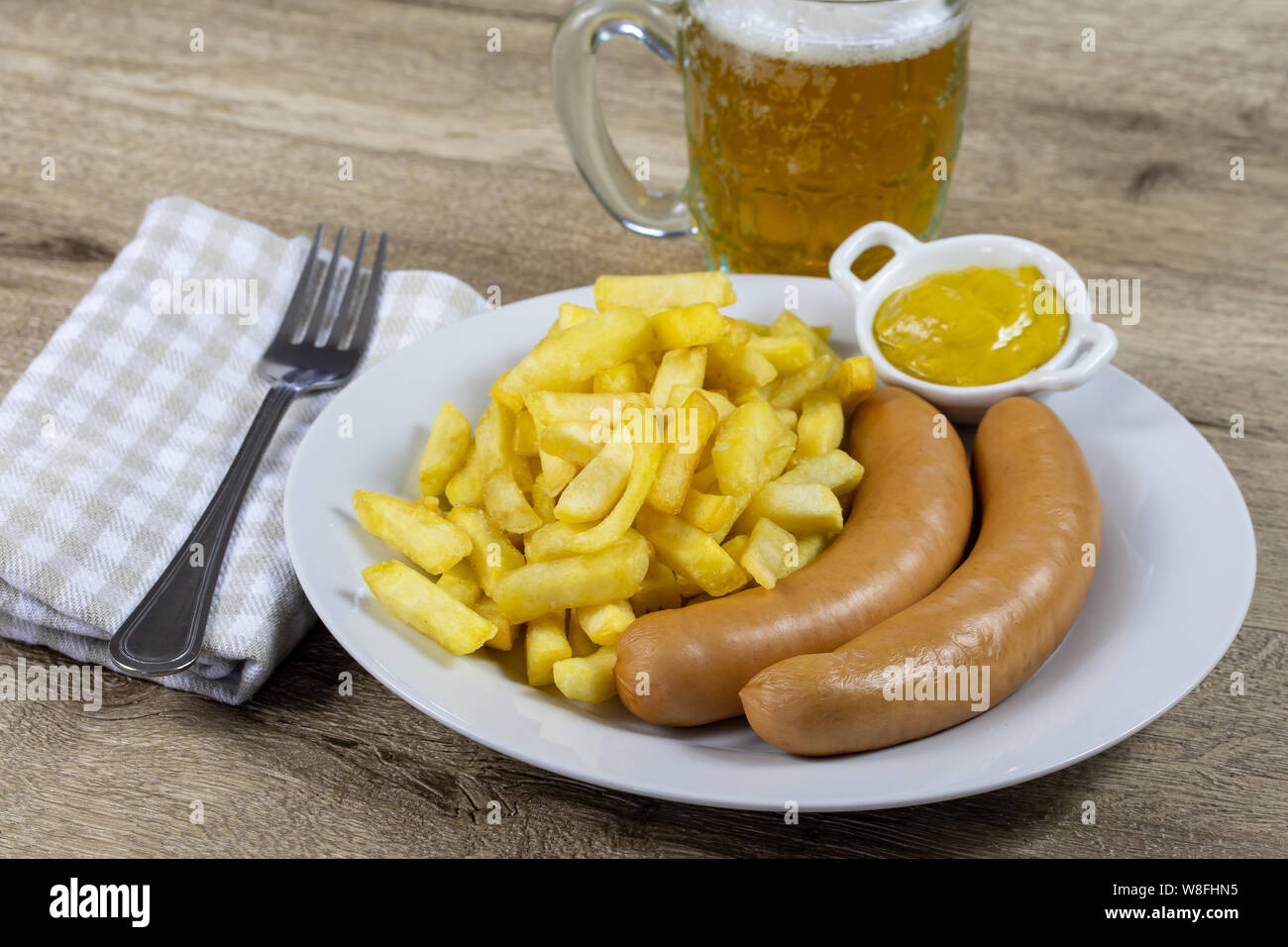 sausage and french fries Stock Photo - Alamy