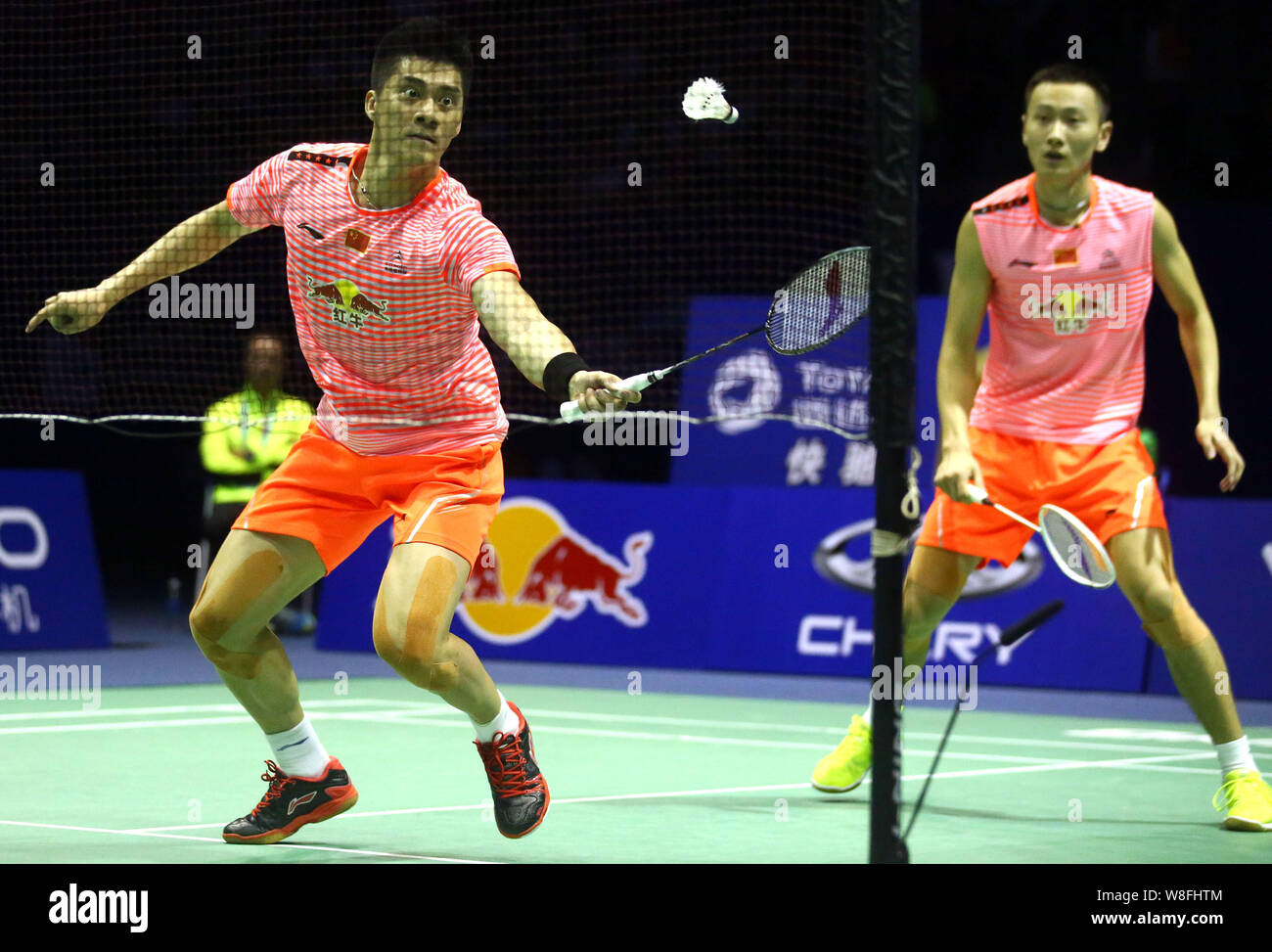 Fu Haifeng, right, and Zhang Nan of China compete against Hiroyuki Endo ...