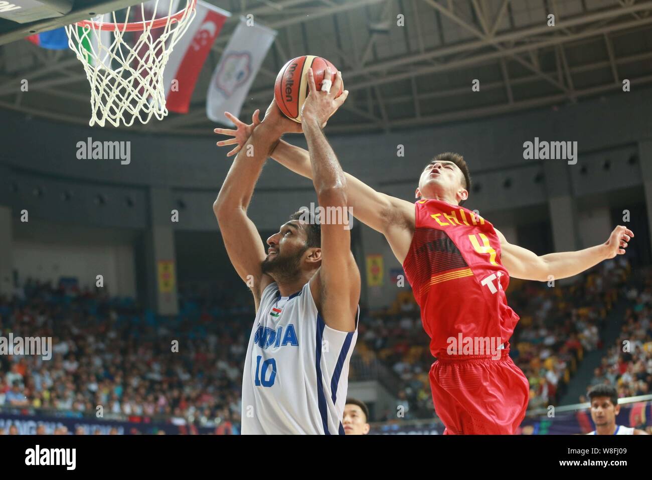 Zhao Jiwei of China, right, challenges Amritpal Singh of India in a ...
