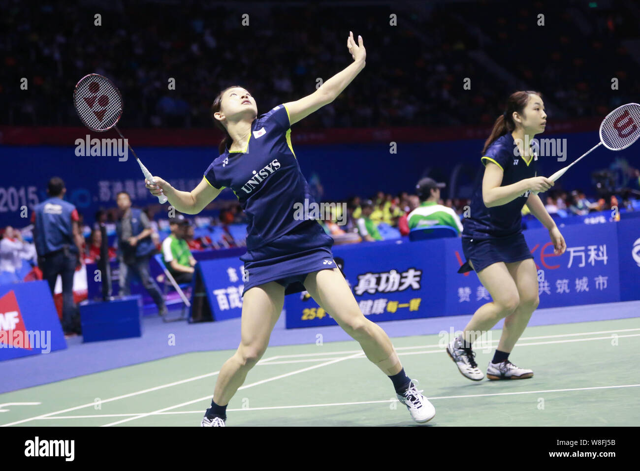 Ayaka Takahashi, left, and Misaki Matsutomo of Japan compete against Hsieh Pei Chen and Wu Ti ...