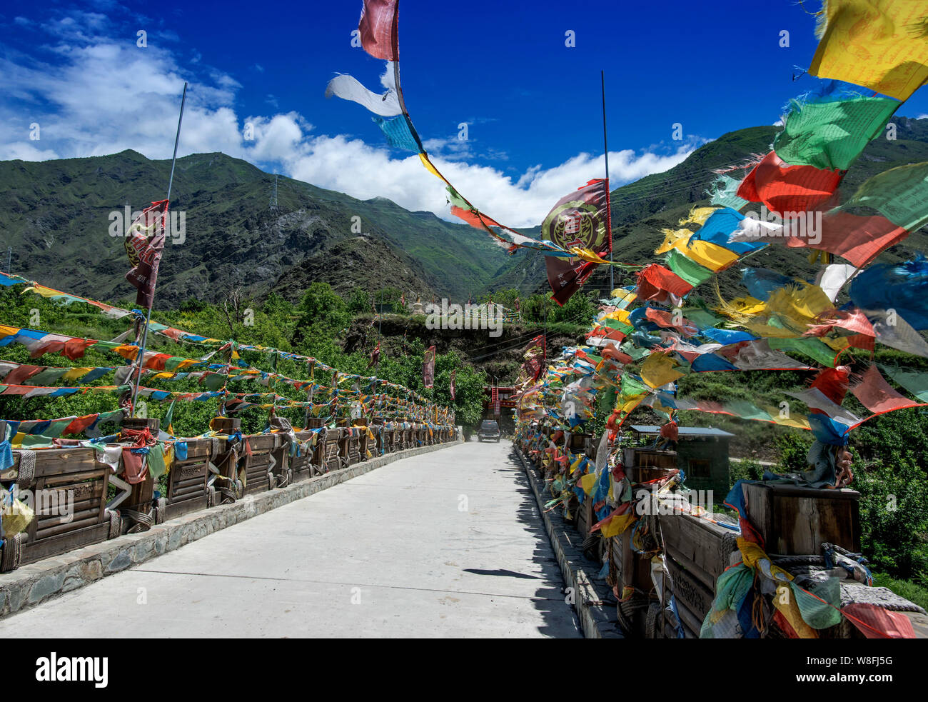 Tibetan prayer flags flutter in the Sero Ancient Tibetan Villlage in ...