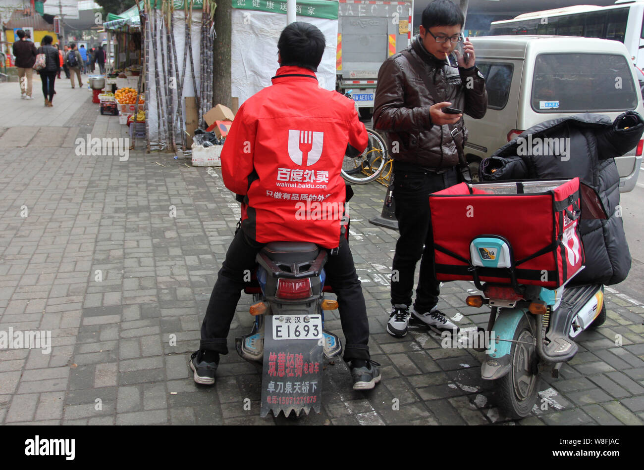 A Chinese deliveryman of Baidu's food delivery service Baidu Waimai ...