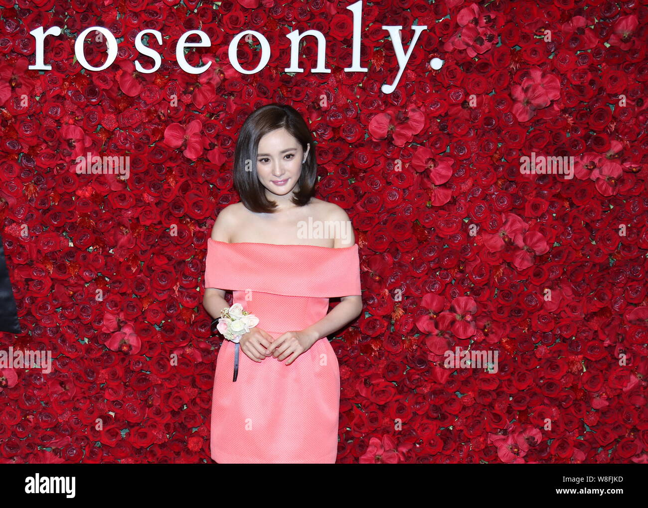 Chinese actress Yang Mi poses during the opening ceremony for a new ...