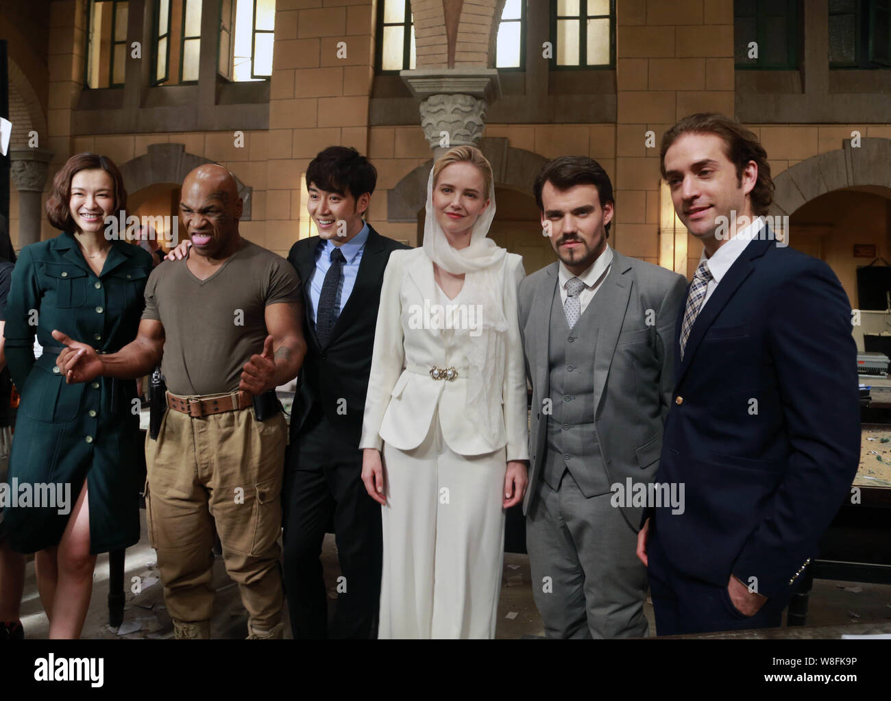 (From left) Chinese model and hostess Li Ai, retired American boxer ...