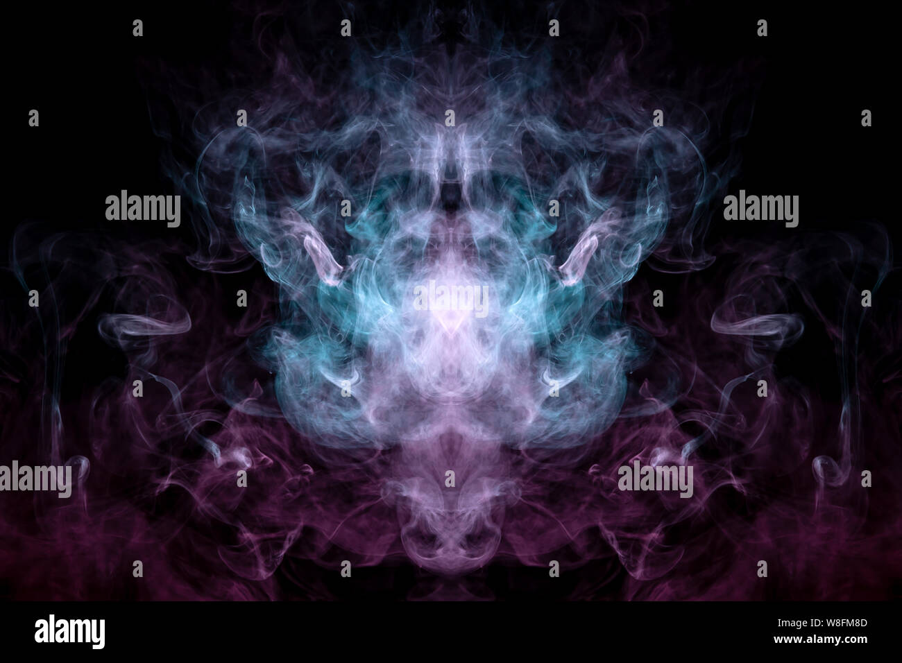 A mystical image of a large face of a creature or ghost with eyes and ...