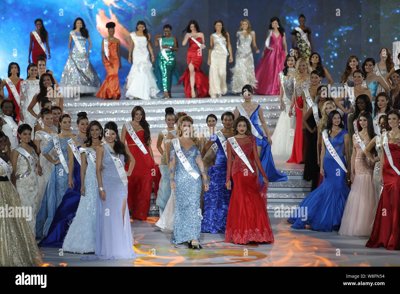 Contestants attend the 65th Miss World finals in Sanya city, south ...