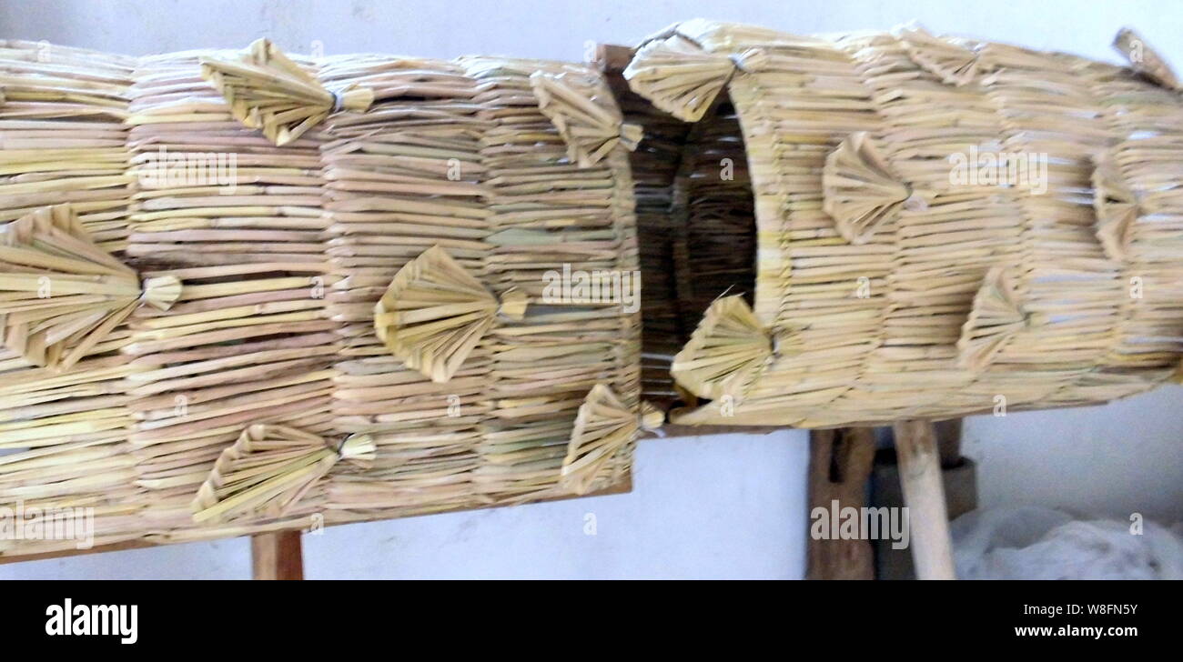Parts of Chinese straw weaving master Yu Fangze's 27.8-meter-long straw ...
