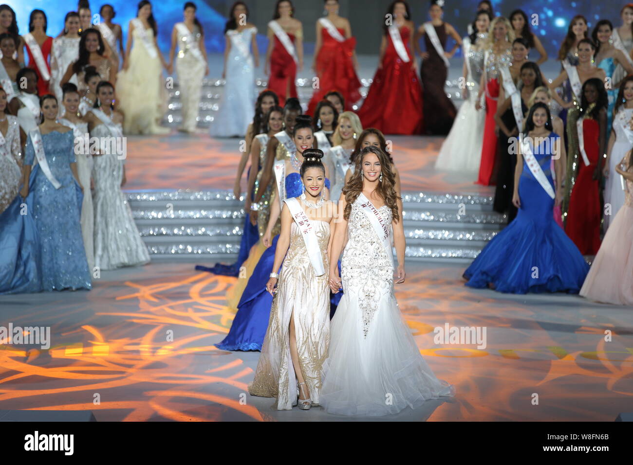 Contestants attend the 65th Miss World finals in Sanya city, south ...