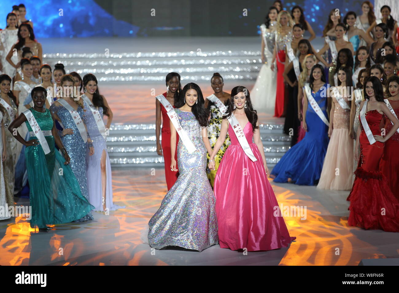 Contestants attend the 65th Miss World finals in Sanya city, south ...