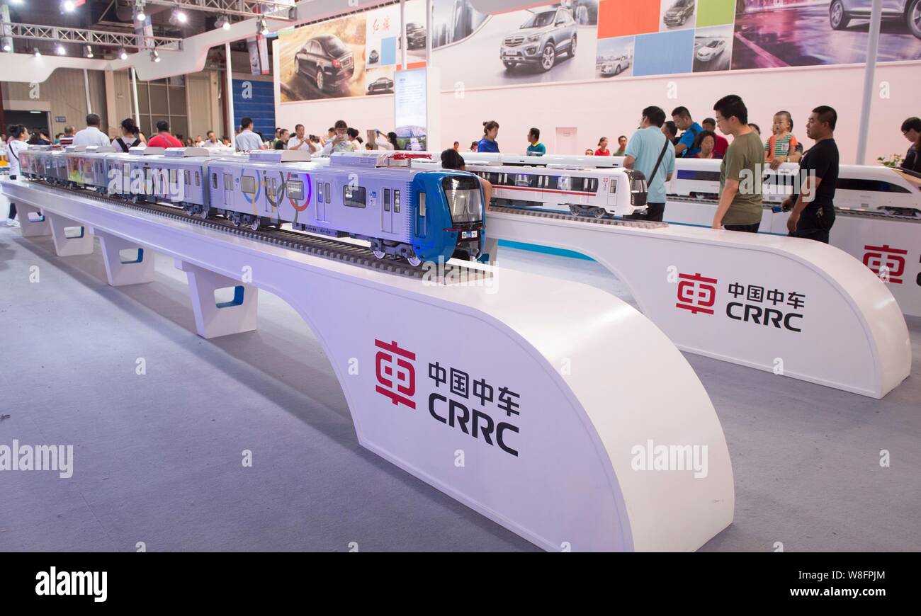 --FILE--Visitors look at models of a CRH (China Railway High-speed ...