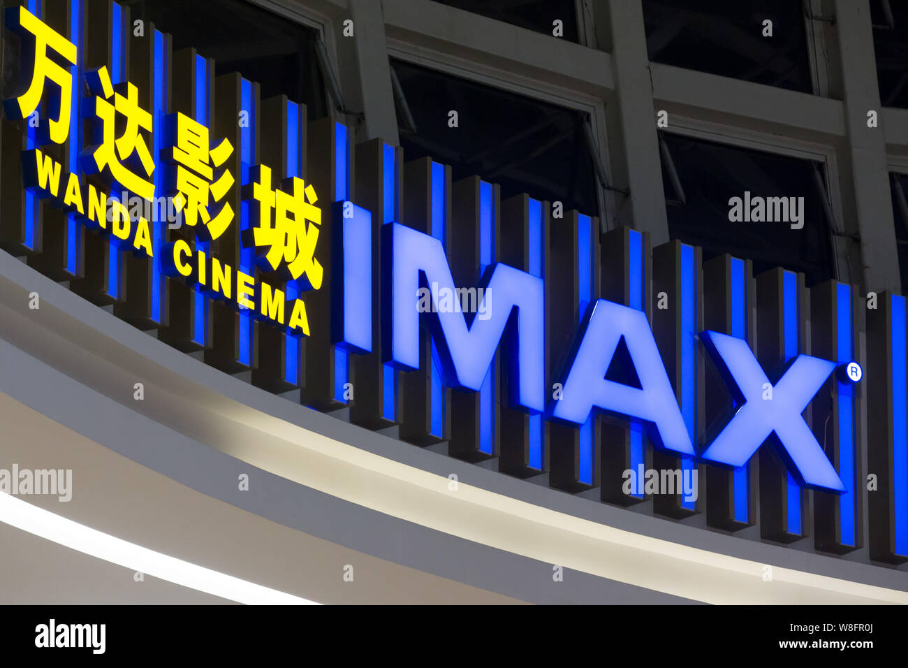 --FILE--View of a signboard of the Wanda Cinema featuring IMAX at the Wanda Plaza in Baoshan ...