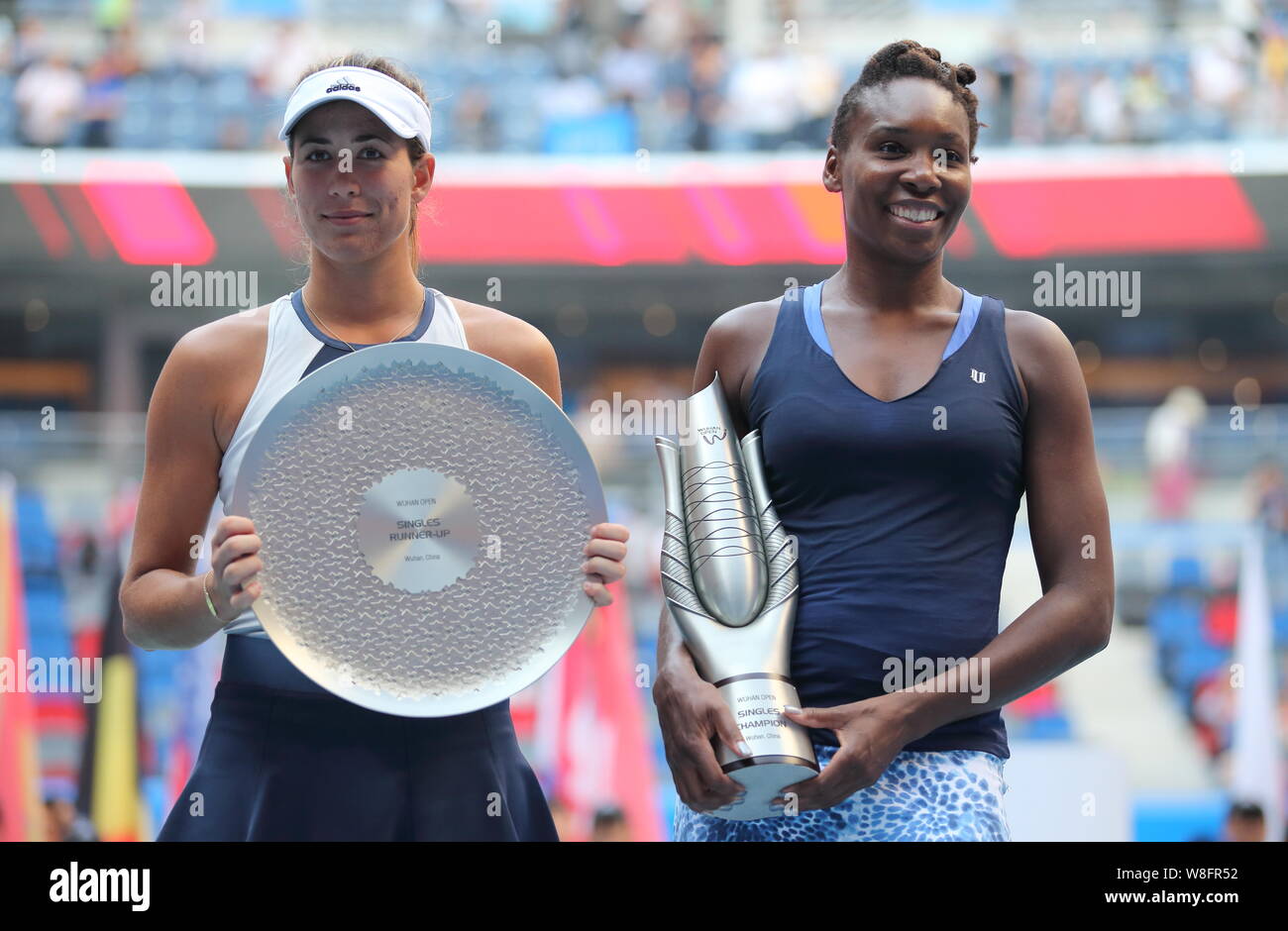 Venus Williams of the United States, right, and Garbine Muguruza of ...