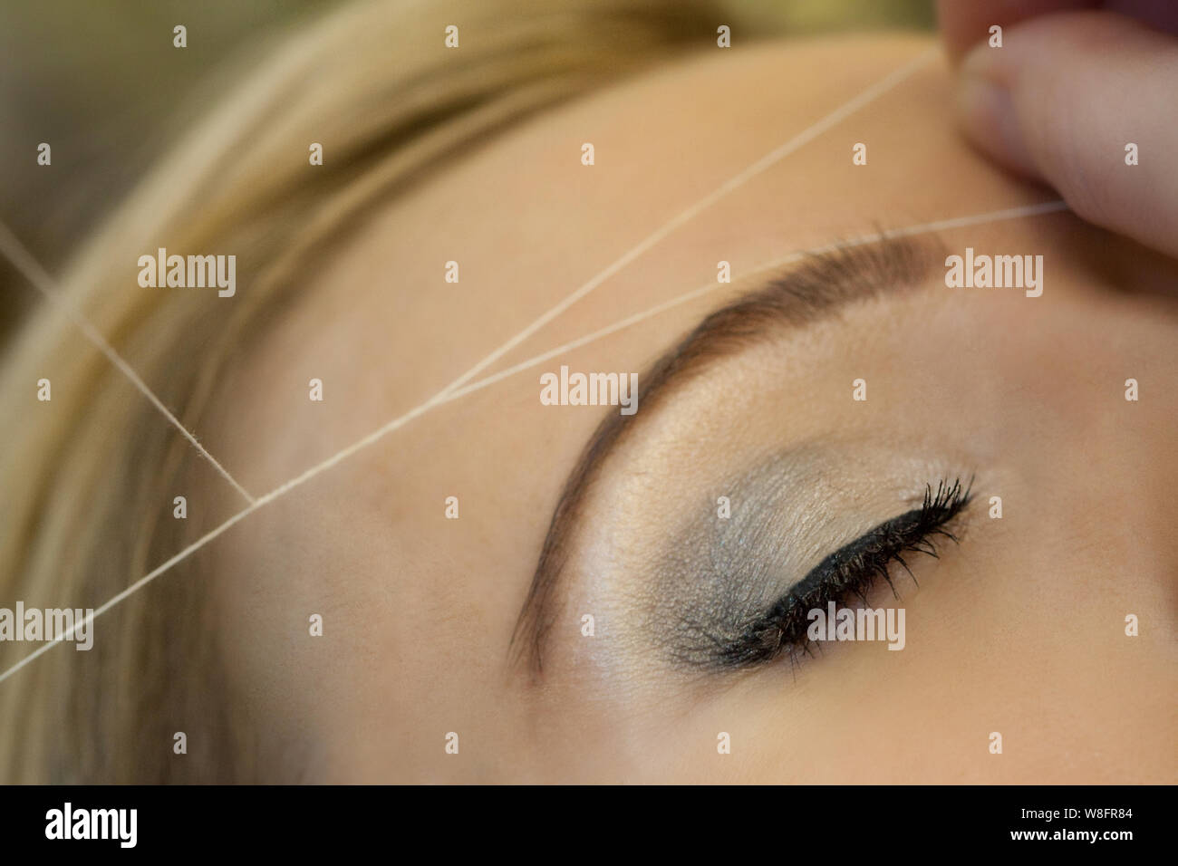 Eyebrow threading hi-res stock photography and images - Alamy Eyebrow threading hi-res stock photography and images - Alamy