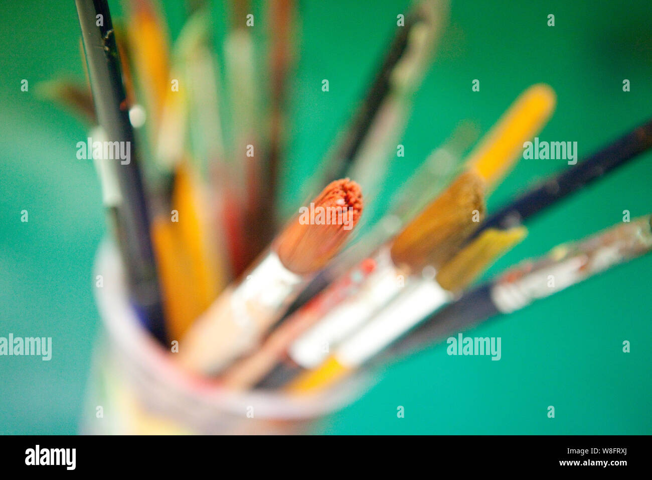 Coloured paint pot and brush hi-res stock photography and images - Alamy