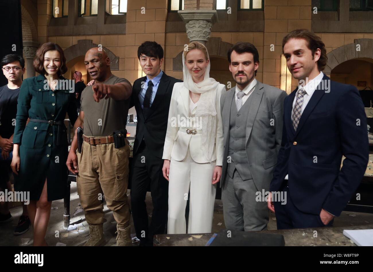 (From left) Chinese model and hostess Li Ai, retired American boxer ...