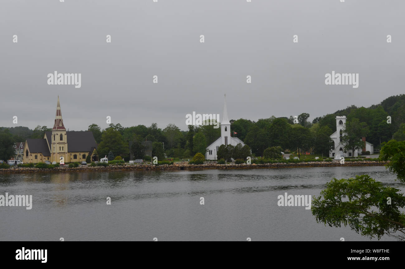 Summer in Nova Scotia: Three Churches of Mahone Bay on an Overcast ...