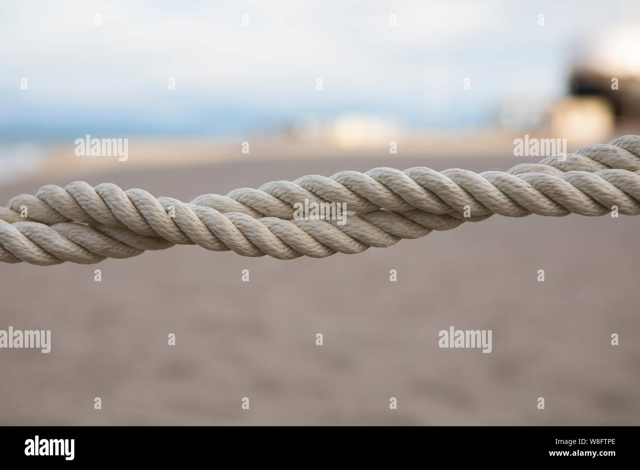 A rope on a beach in France Stock Photo - Alamy
