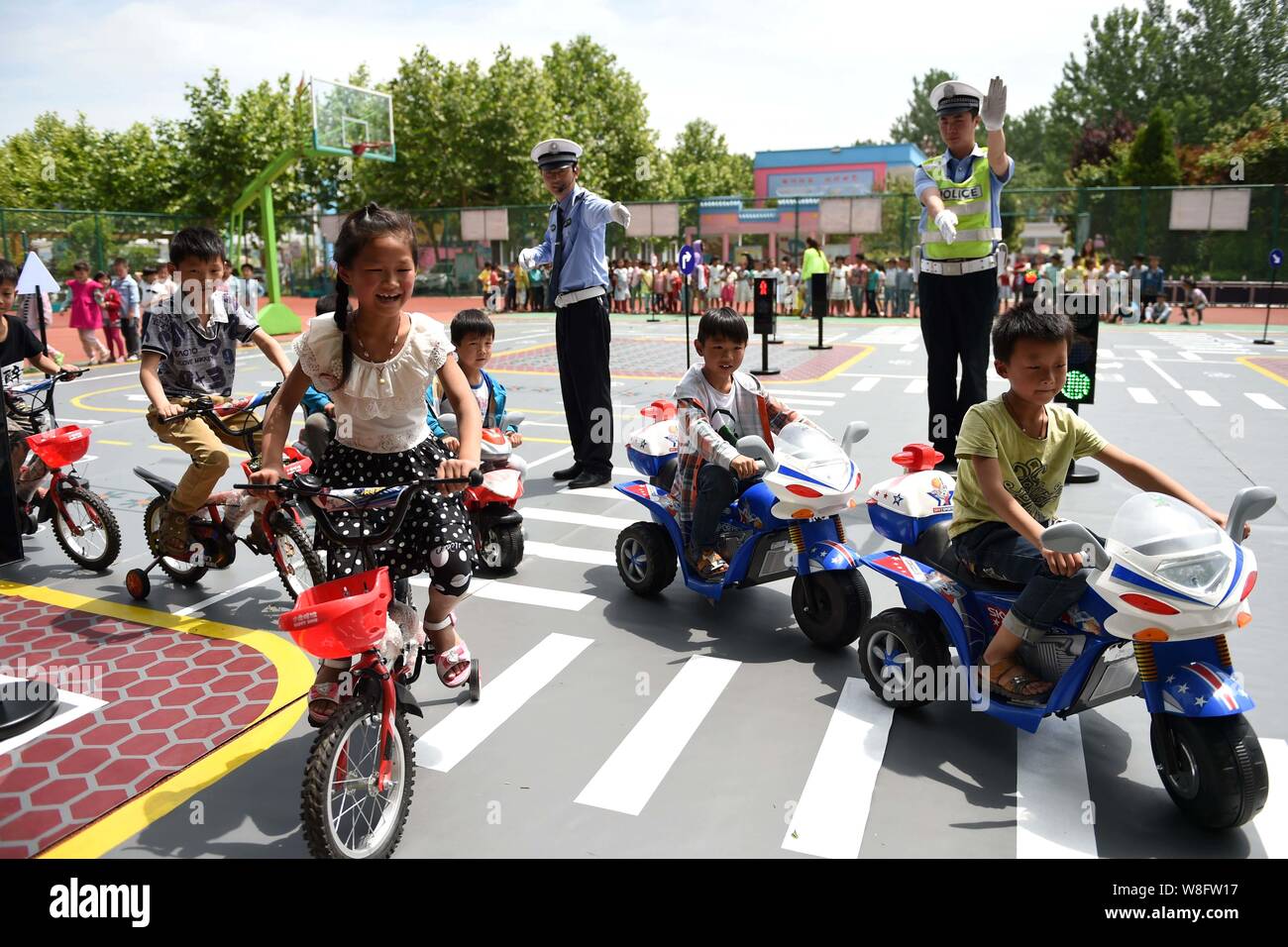 Chinese police toy hi-res stock photography and images - Alamy