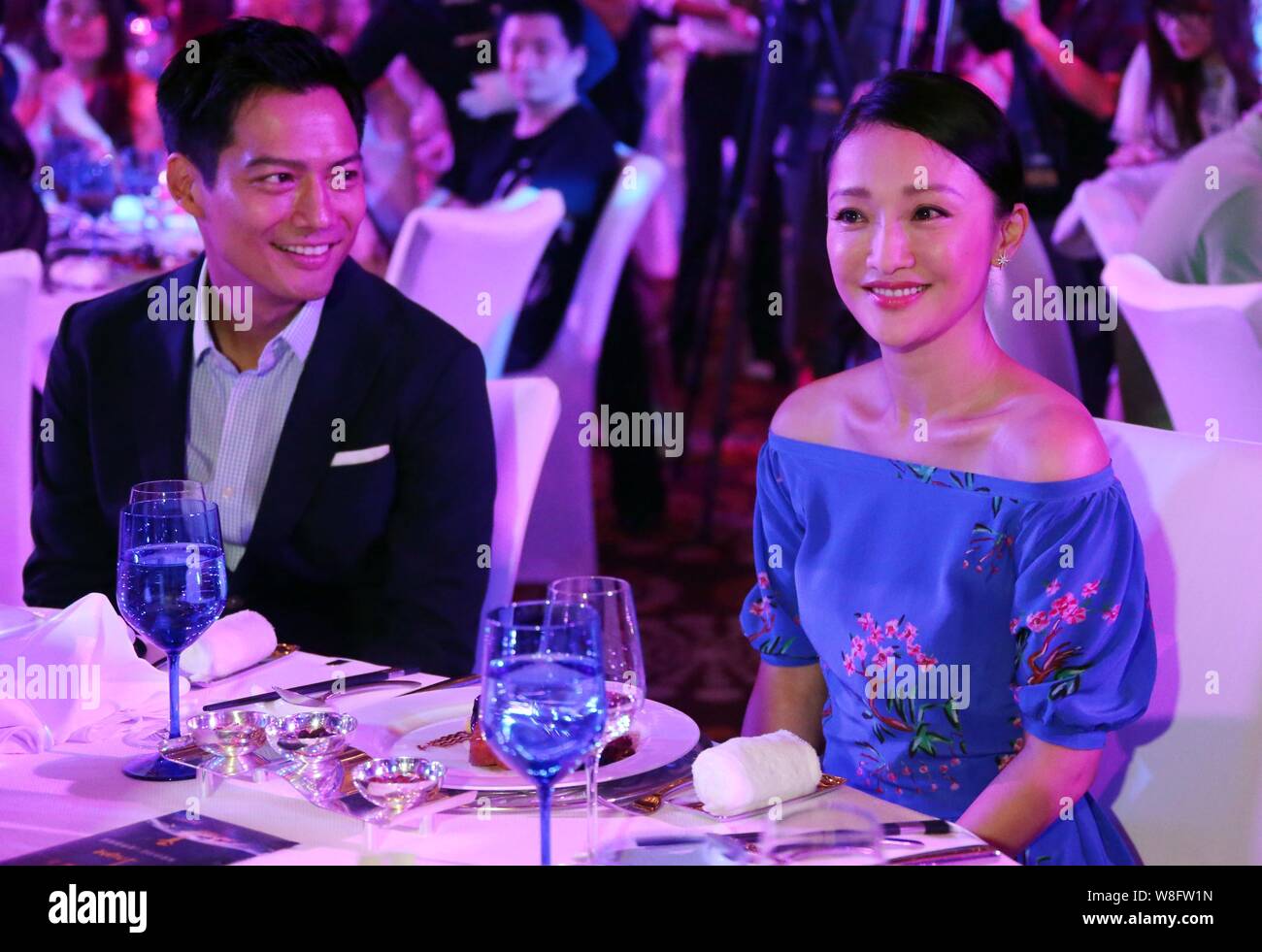 Chinese actress Zhou Xun, right, and her American actor husband Archie ...