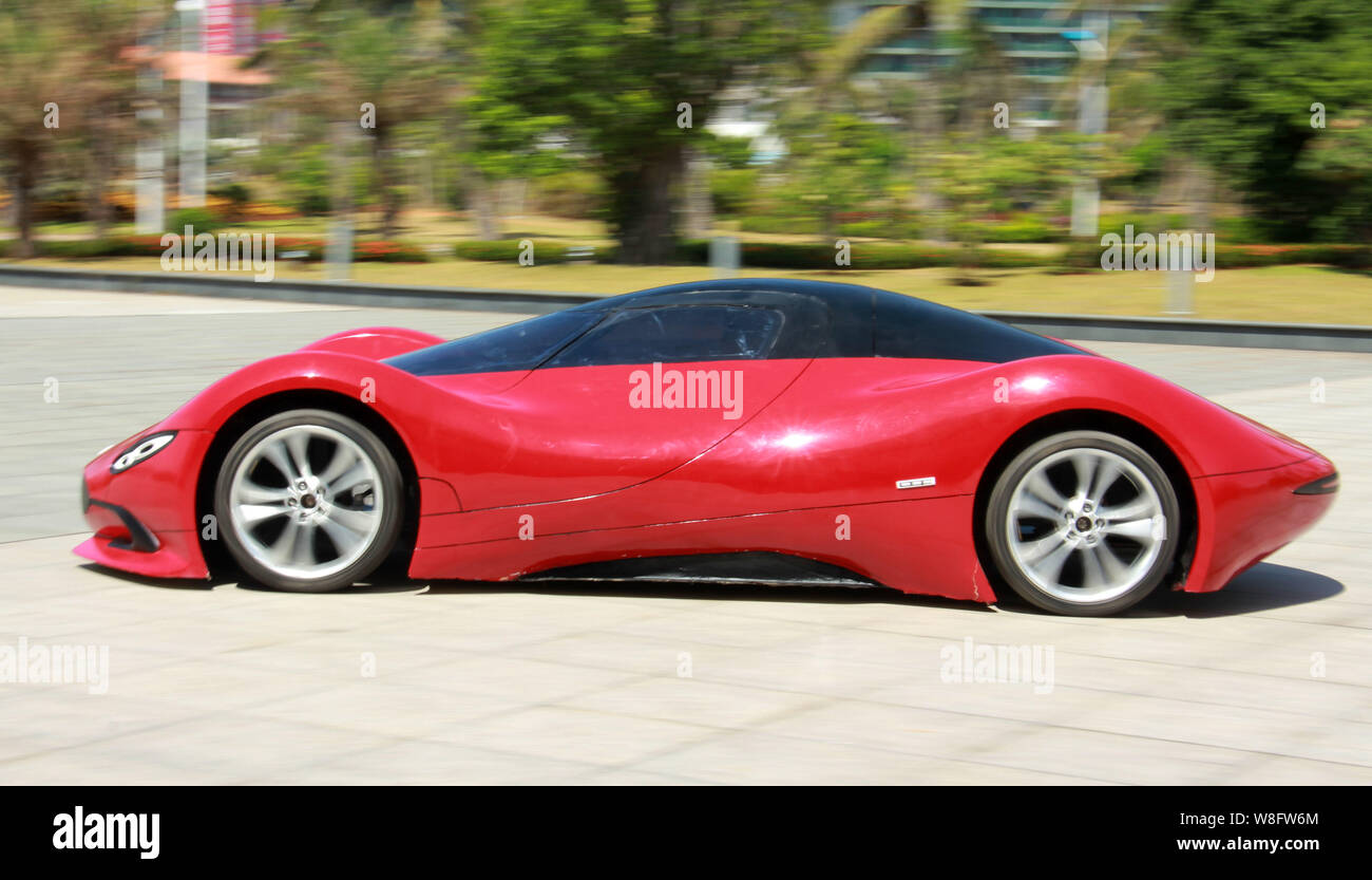 Young Chinese man Chen Yinxi drives his homemade electric sports car on ...