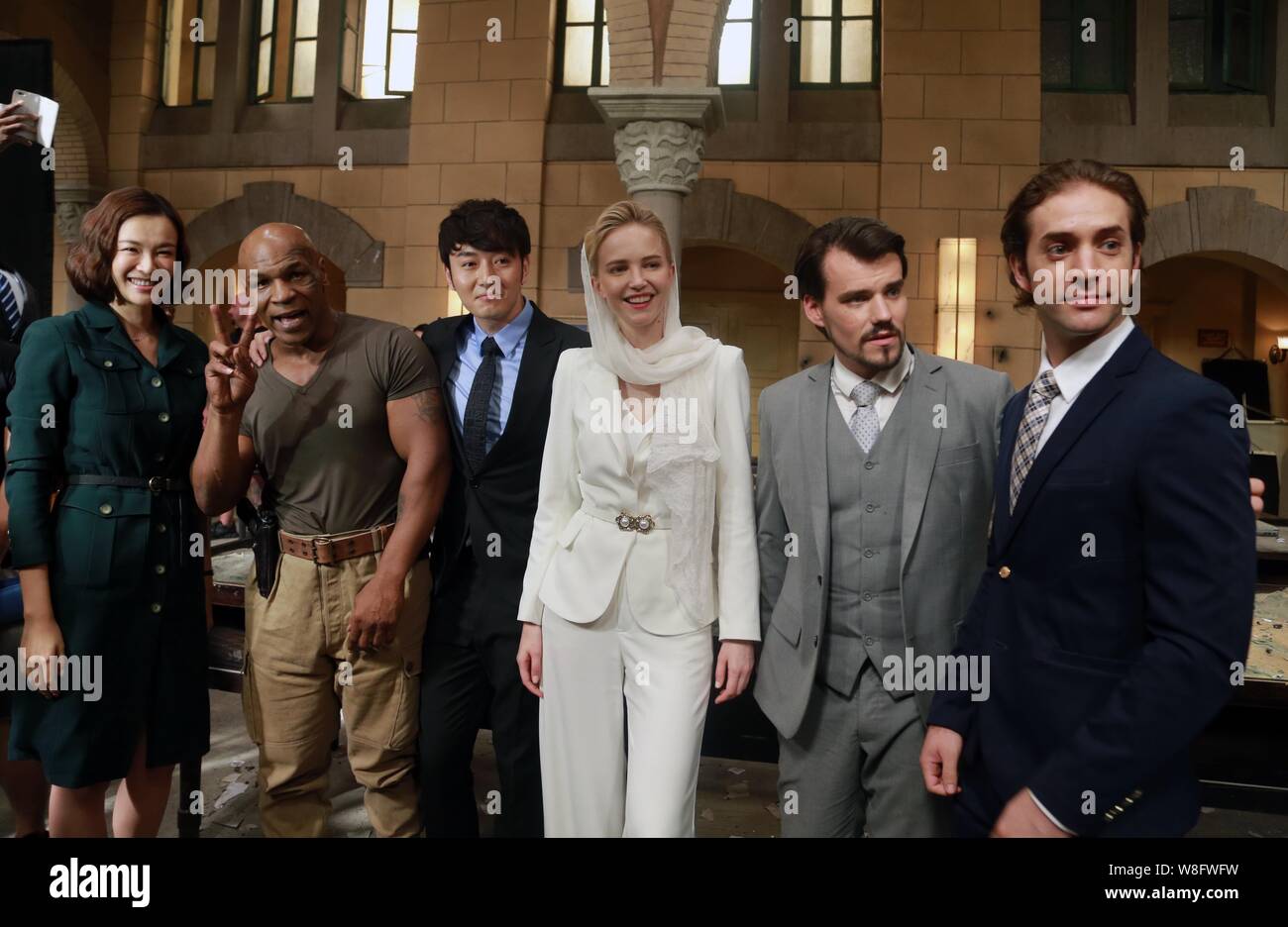 (From left) Chinese model and hostess Li Ai, retired American boxer ...