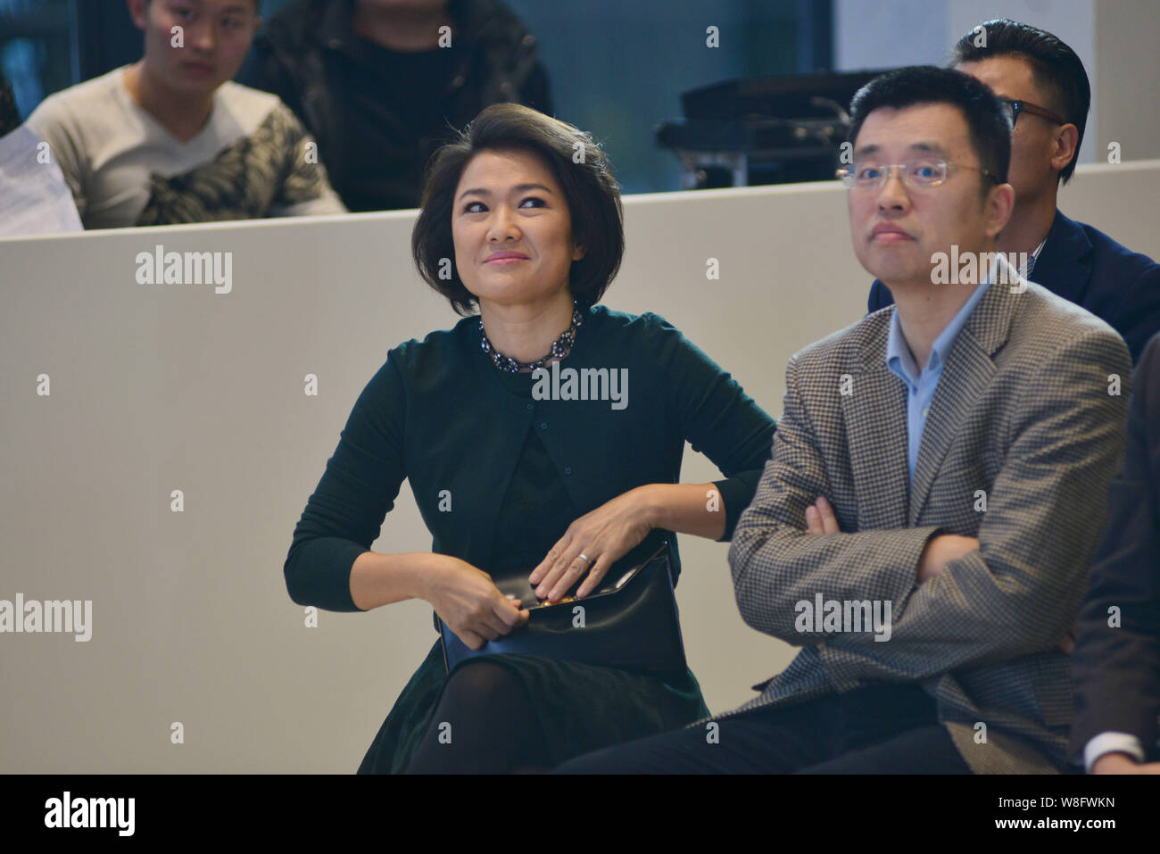 Zhang Xin, left, co-founder, co-CEO of SOHO China and wife of Pan Shiyi, attends the opening ...
