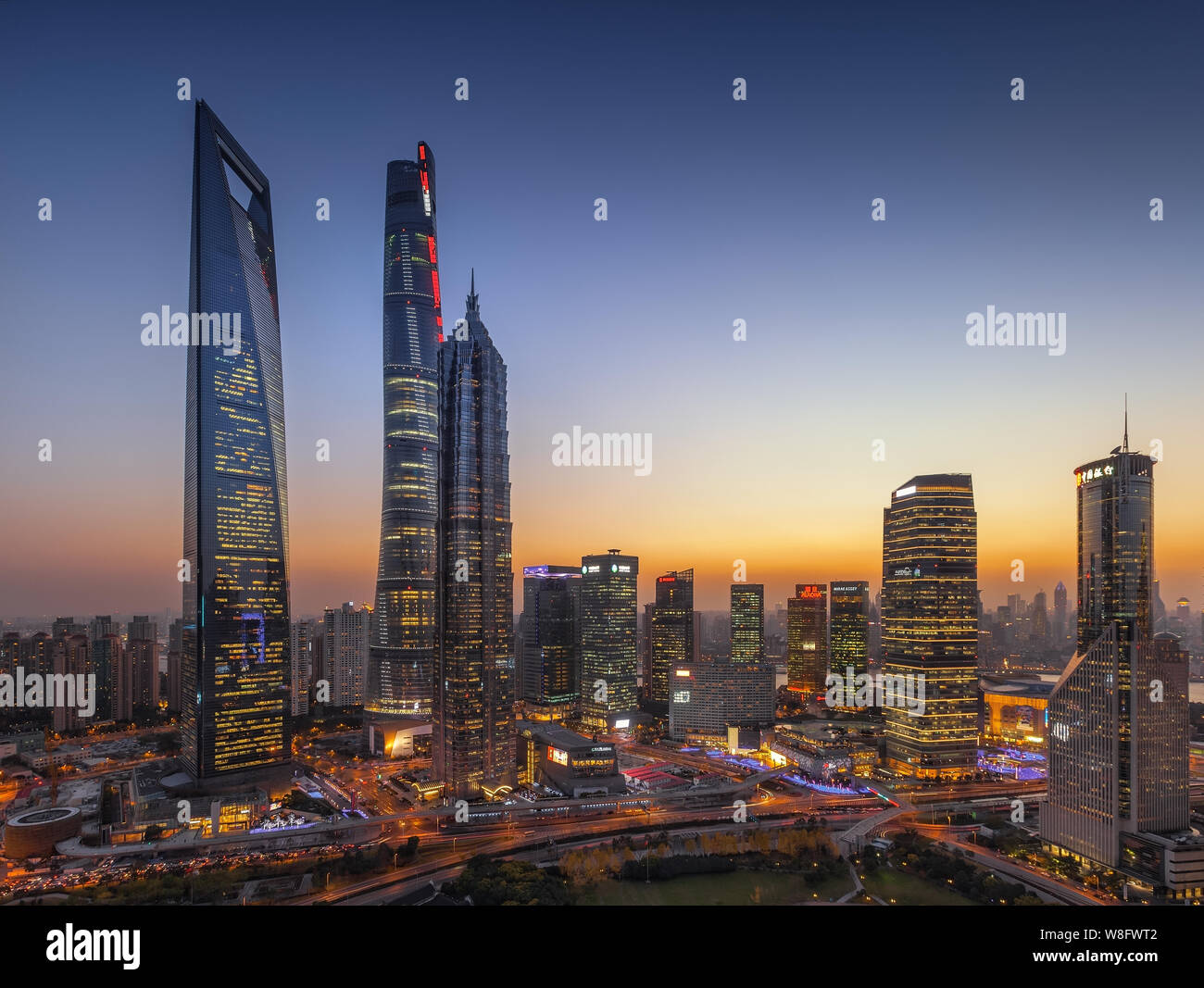 Night view of the Lujiazui Financial District with the Shanghai Tower ...