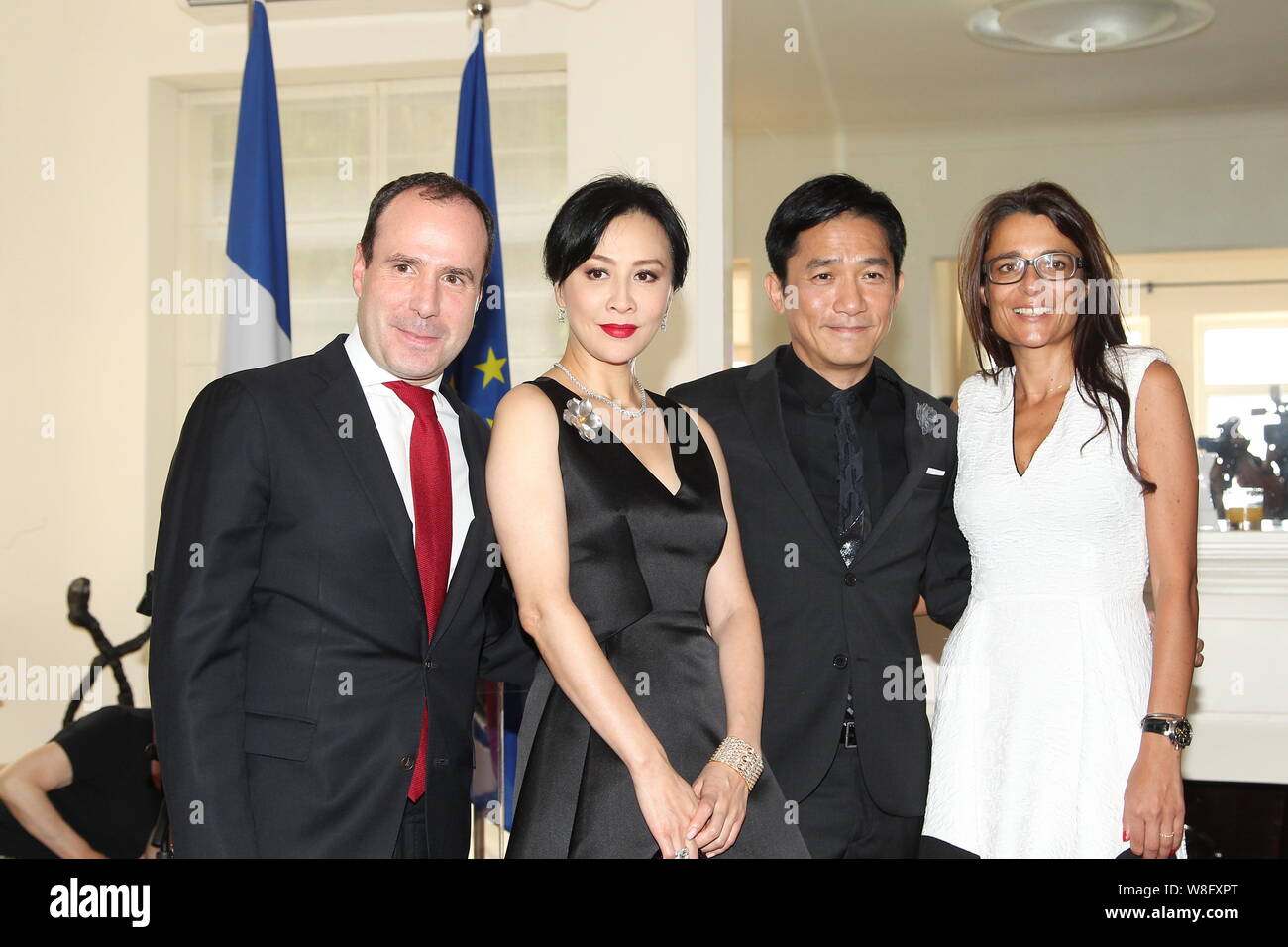 Hong Kong actress Carina Lau, second left, and her actor husband Tony ...