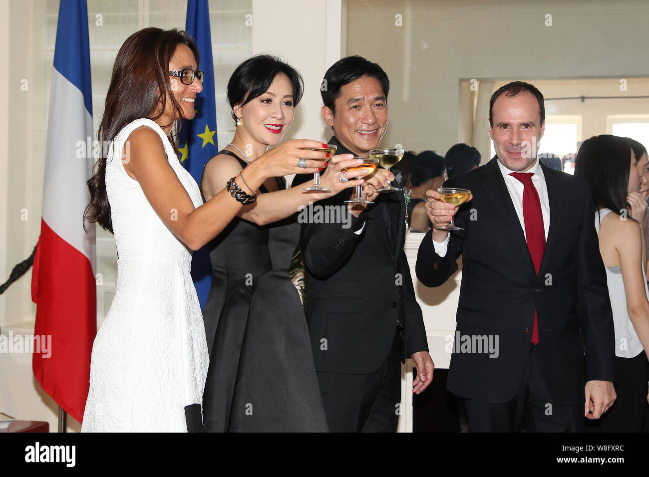 Hong Kong actress Carina Lau, second left, and her actor husband Tony ...