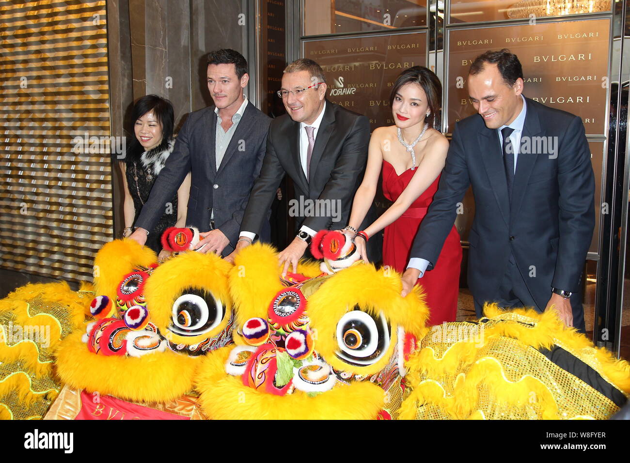 Taiwanese actress Shu Qi, second right, and British actor Luke Evans ...