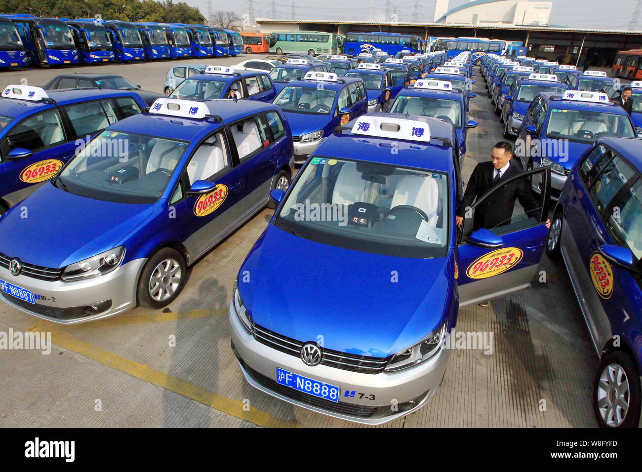 --FILE--Volkswagen's New Touran taxi cars are lined up during a launch ...