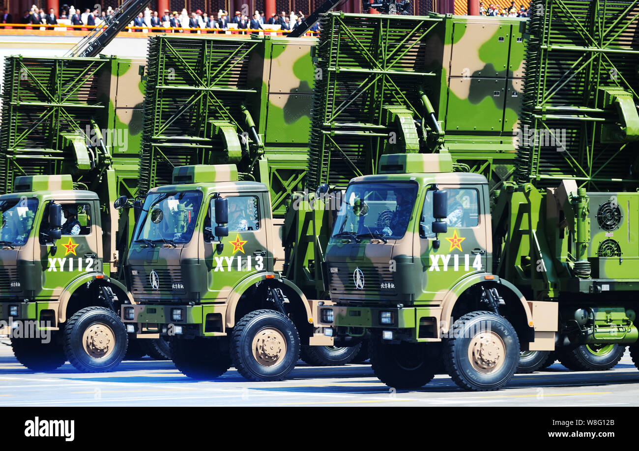 Radar vehicles march past the Tiananmen Rostrum during the military ...
