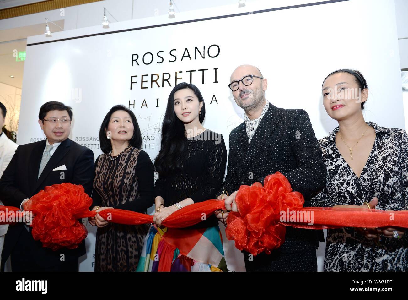 Chinese actress Fan Bingbing (third left) poses with executive of ...